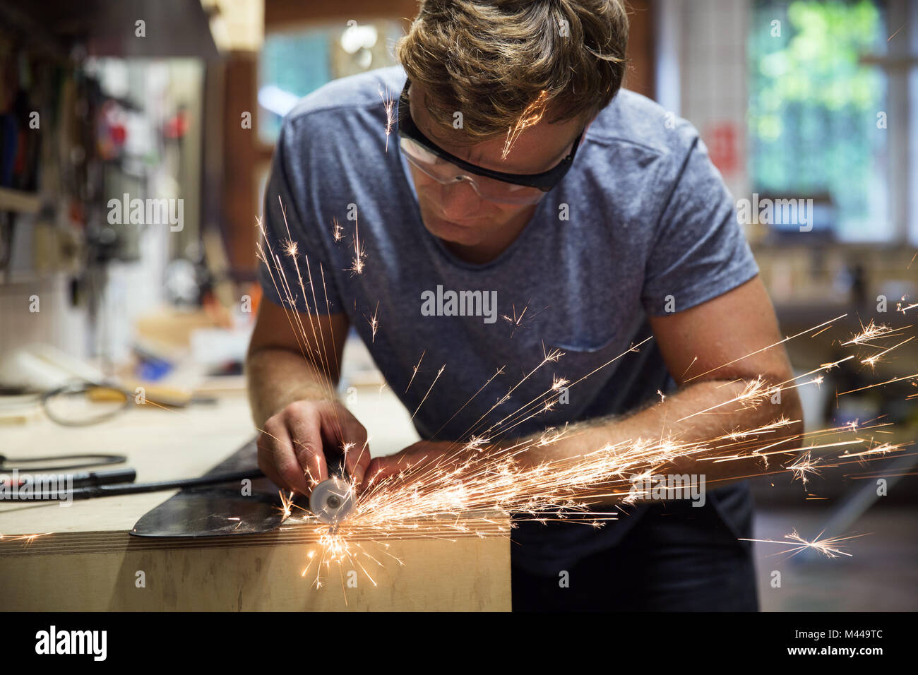 Using hand tools hi-res stock photography and images - Alamy