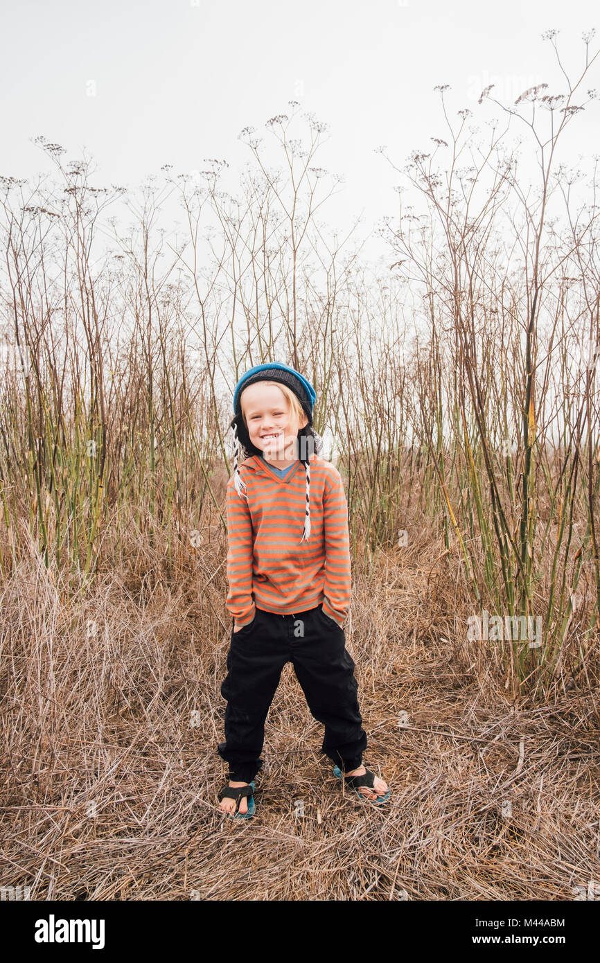 Boy standing with hands in pocket hi-res stock photography and images ...