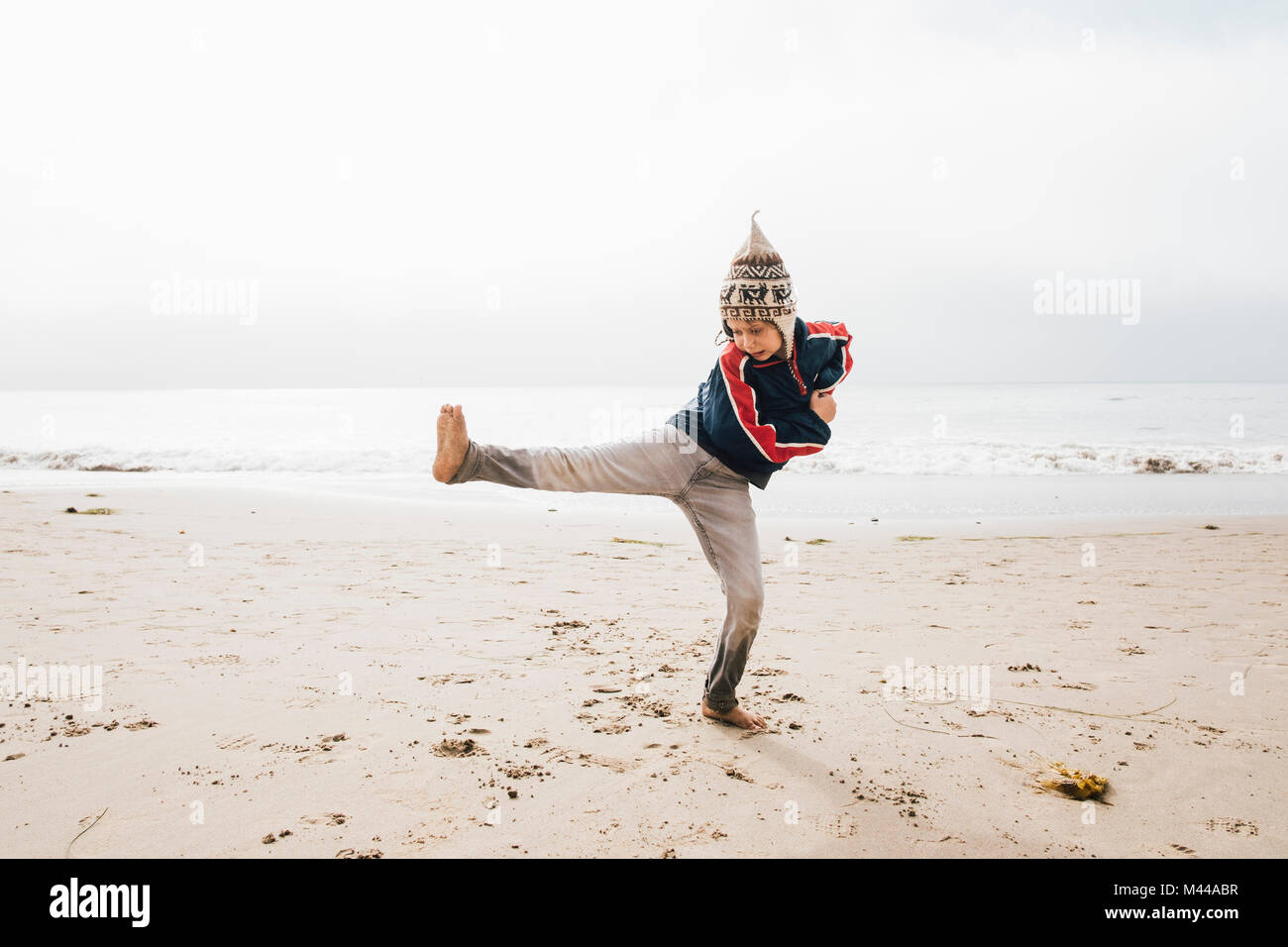 One boy standing hi-res stock photography and images - Alamy