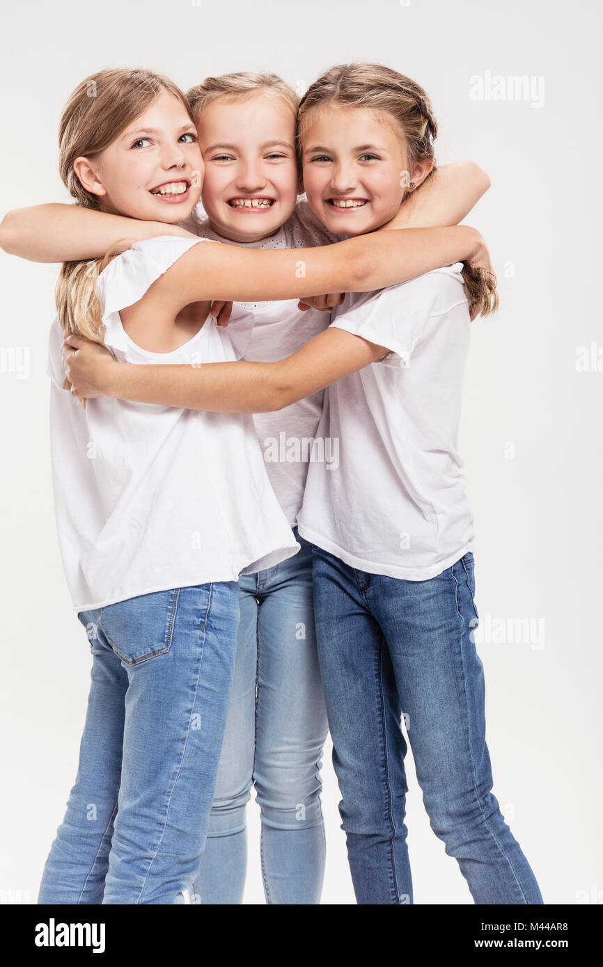 Children arms around each other hi-res stock photography and images - Alamy