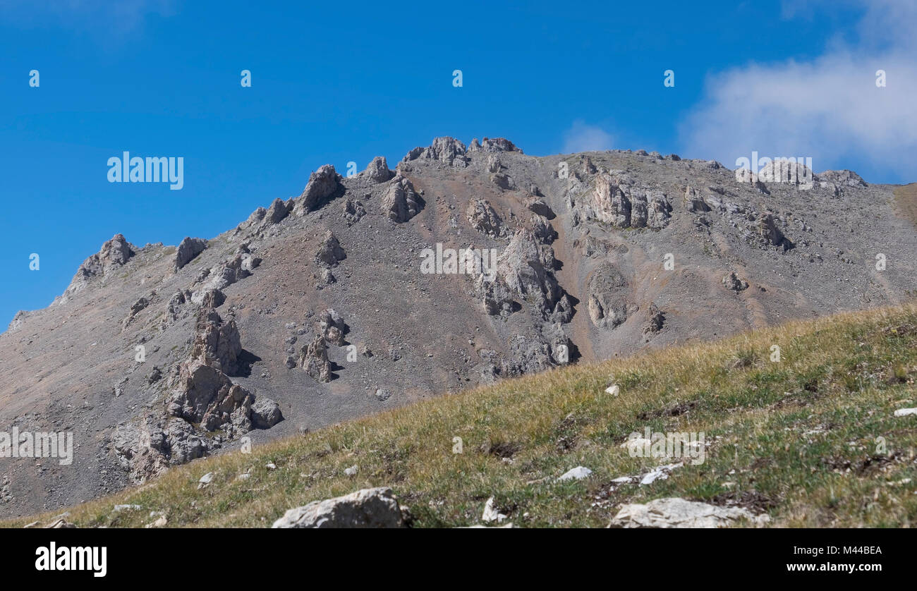 Sharp and dangerous rocks composed of sedimentary rocks Stock Photo - Alamy