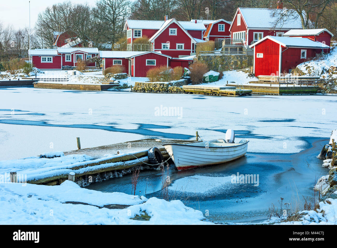 Wooden boat outside house hi-res stock photography and images - Alamy