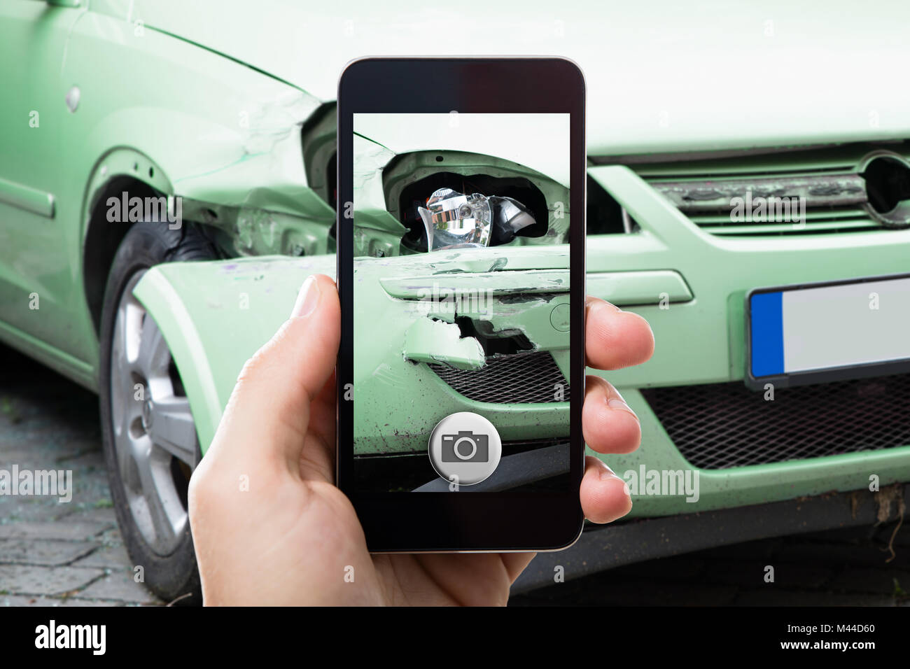 Close Up Of A Hand Taking Photo Of Car Accident Through Smartphone ...