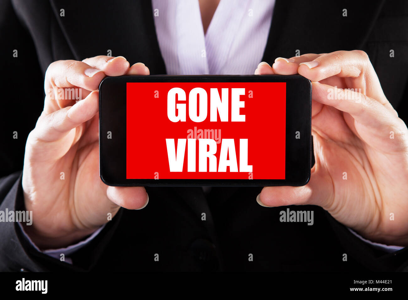 Close-up Of A Person Hand Holding Smartphone Showing Text Gone Viral On ...