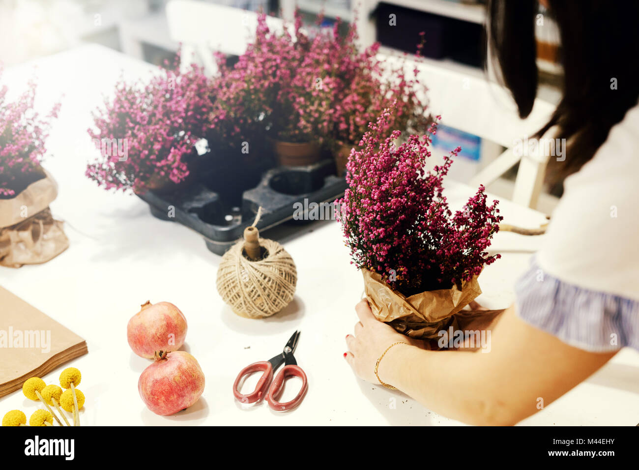Woman creating organic composition in workshop Stock Photo - Alamy