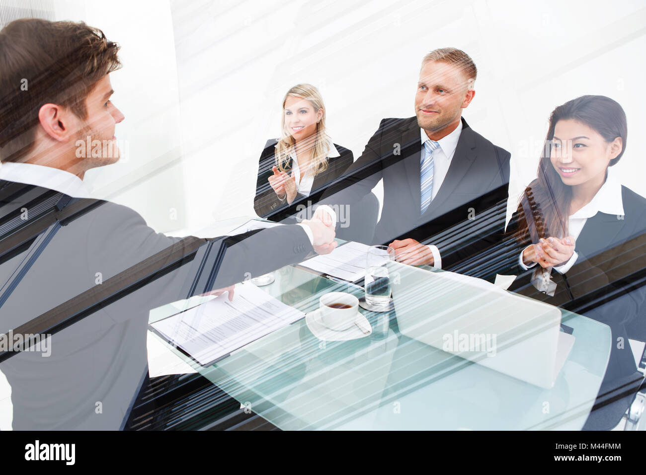 Business handshake multiple hi-res stock photography and images - Alamy