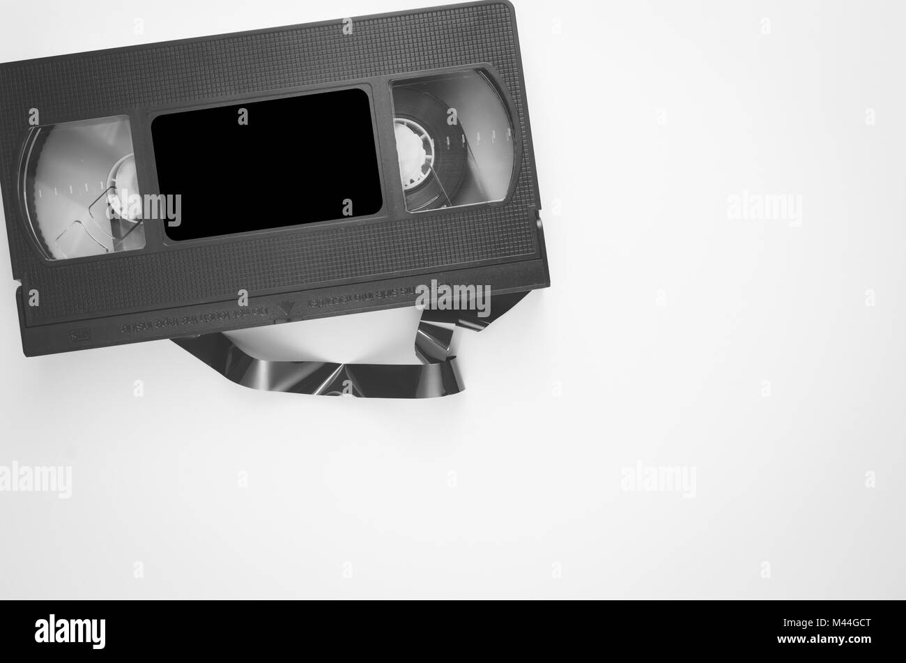 VHS compact magnetic tape analog recording cassette with blank label ...