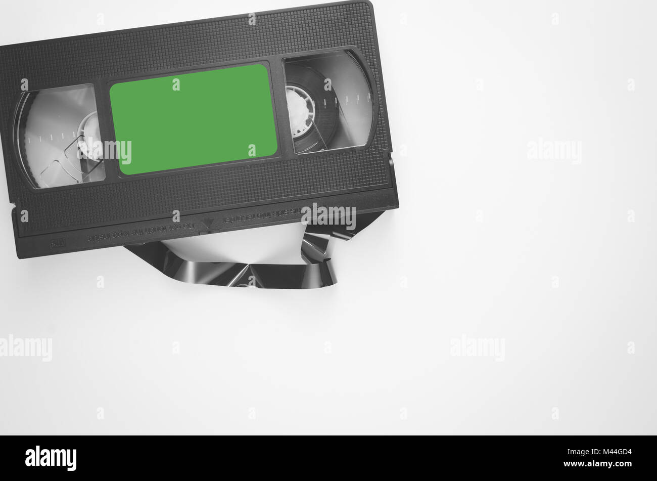 VHS compact magnetic tape analog recording cassette with blank label ...