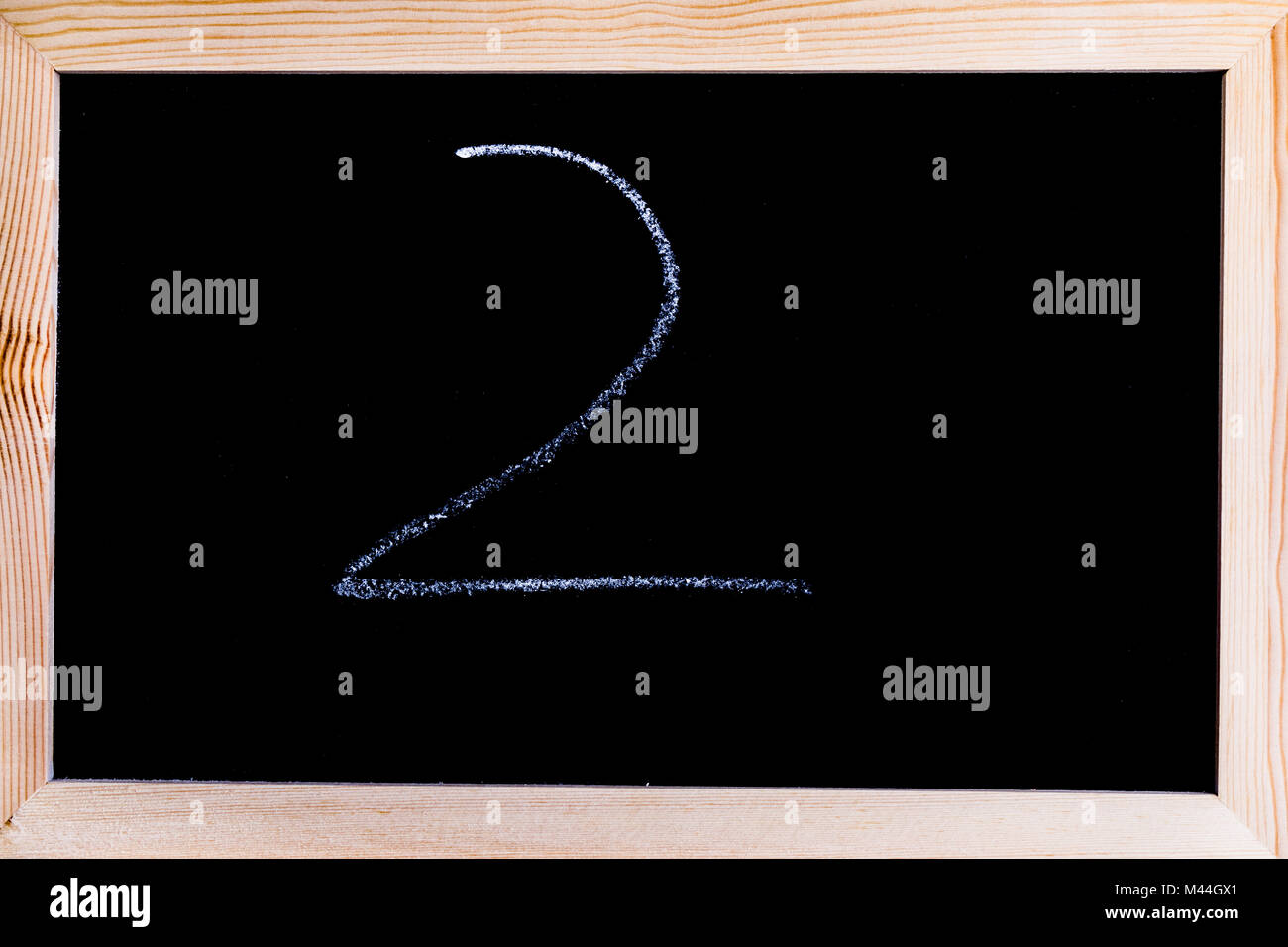 Blackboard with the number 2 written on it Stock Photo - Alamy
