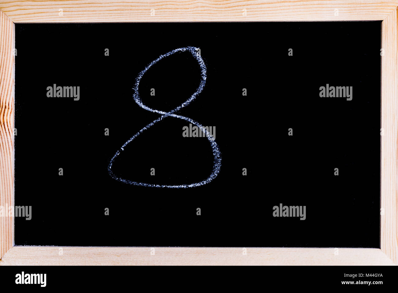 Blackboard with the number 8 written on it Stock Photo - Alamy