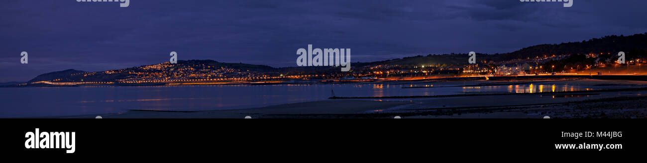 Panorama of Colwyn Bay at night on the North Wales coast with ...