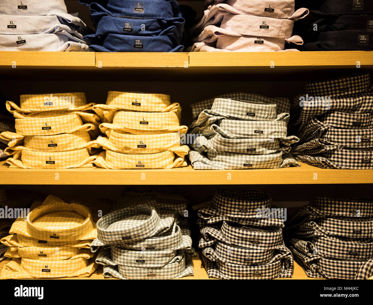 Folded shirt stack hi-res stock photography and images - Alamy