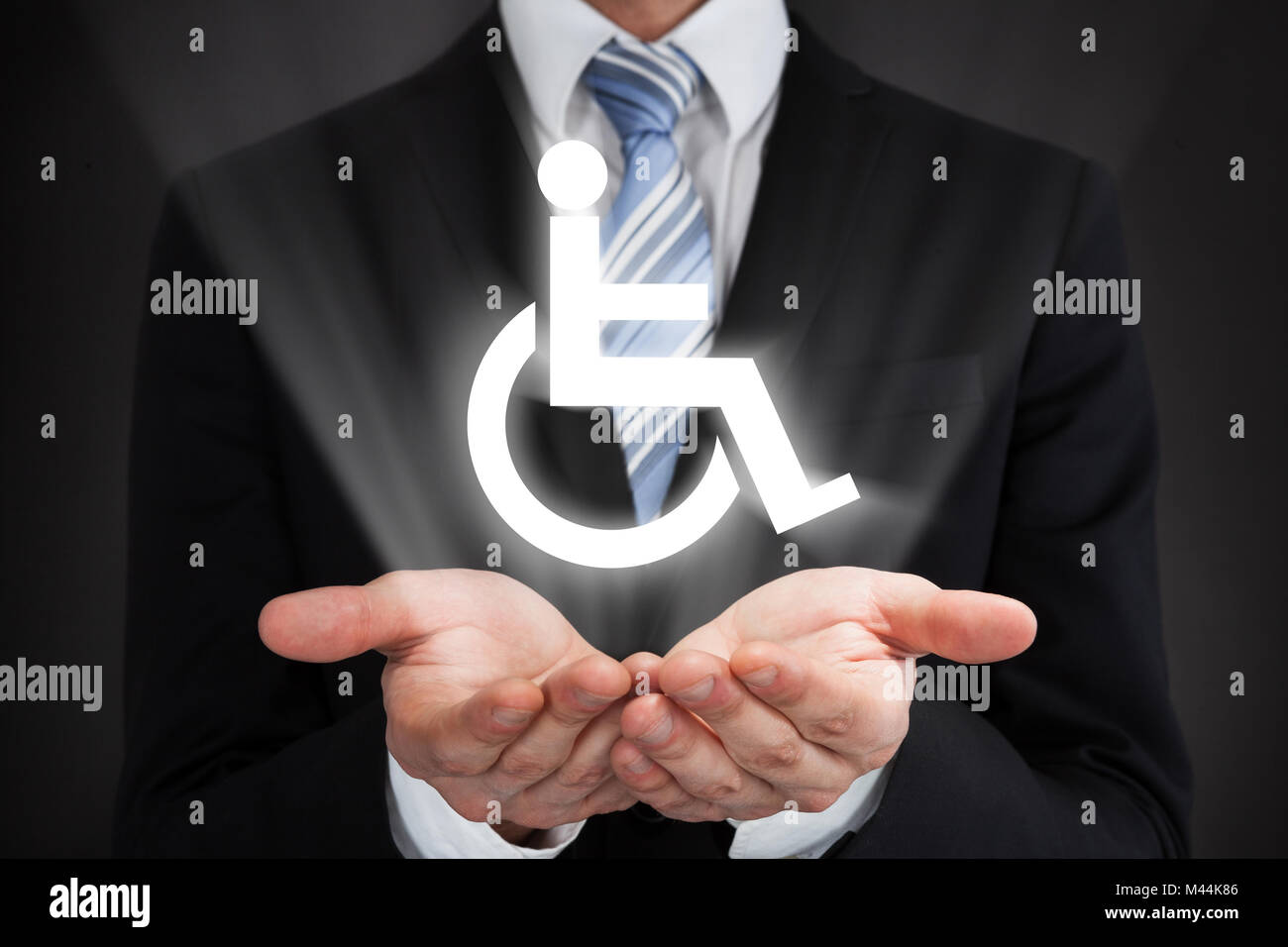 Hand holding wheelchair hi-res stock photography and images - Alamy