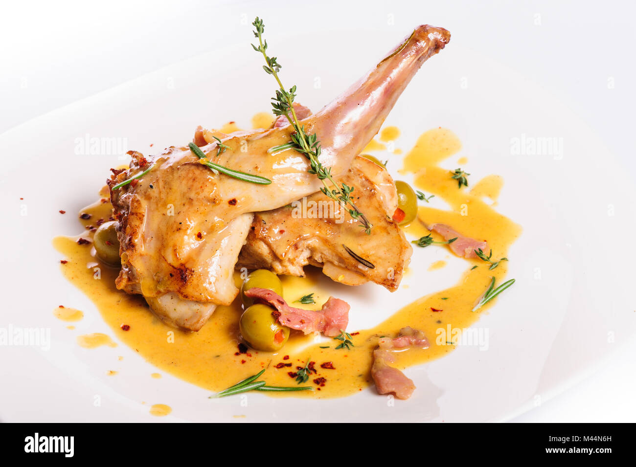 Prepared rabbit legs Stock Photo - Alamy