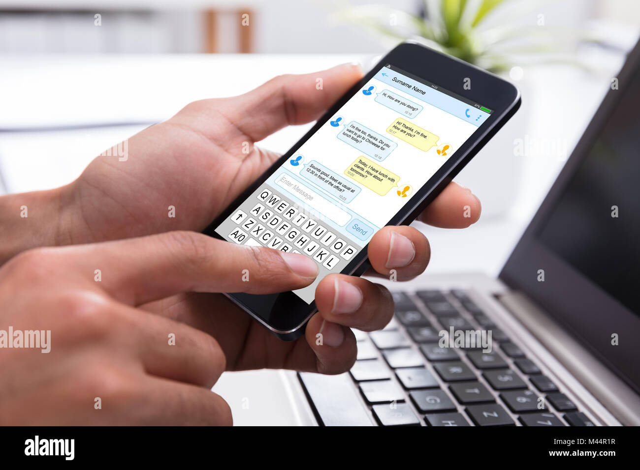 Mobile phone keypad hand hi-res stock photography and images - Alamy