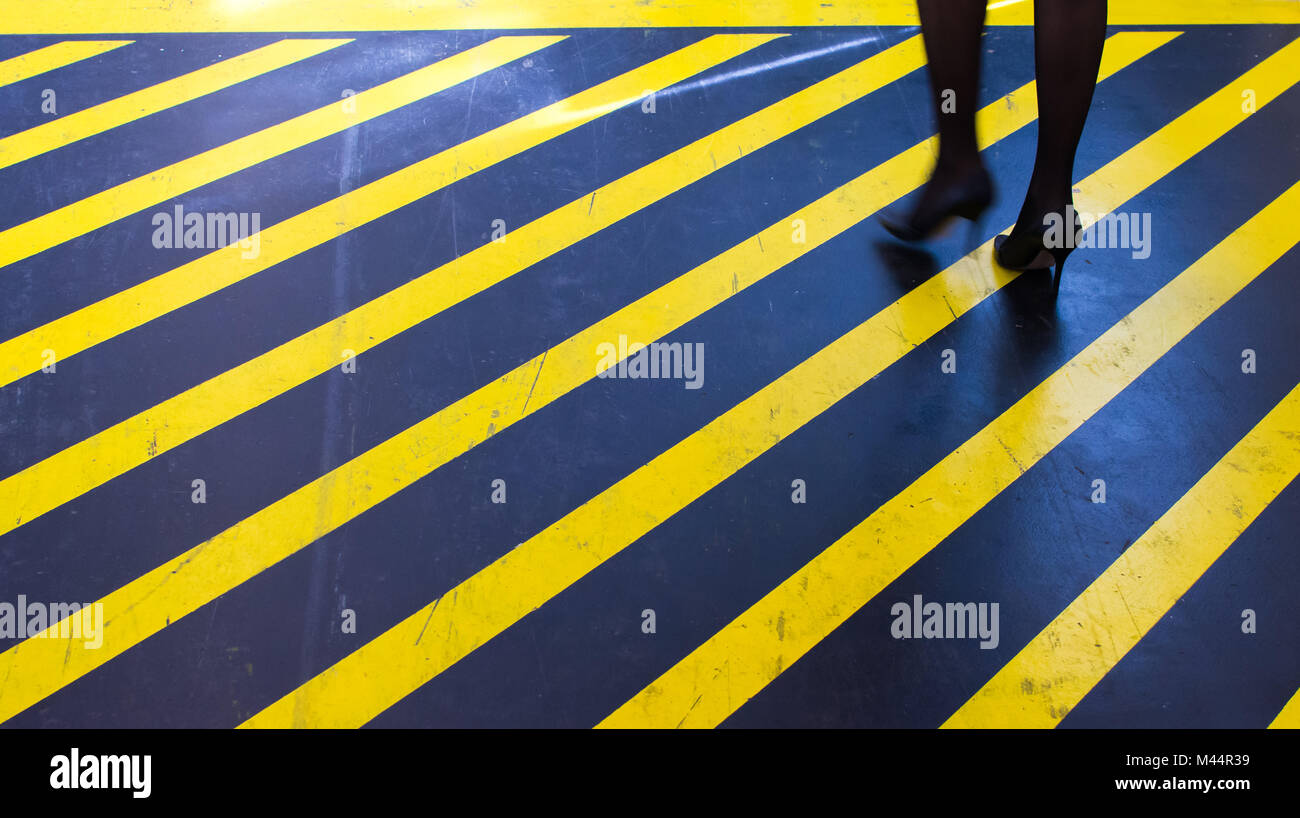Yellow footsteps hi-res stock photography and images - Alamy