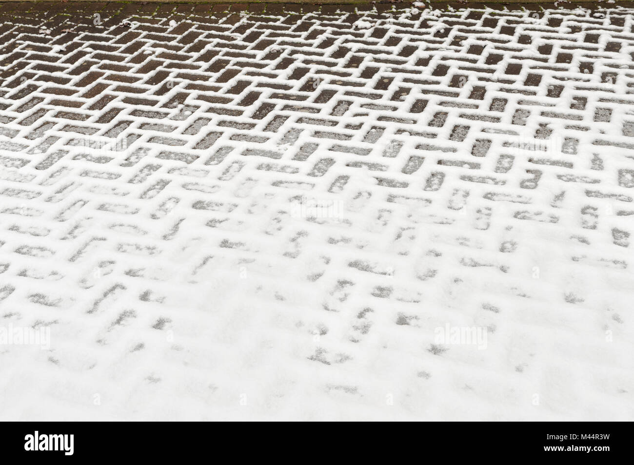 patterns in snow caused by heat conduction on drive with heat loss from ...