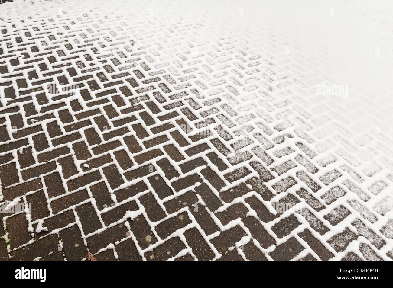 patterns in snow caused by heat conduction on drive with heat loss from ...