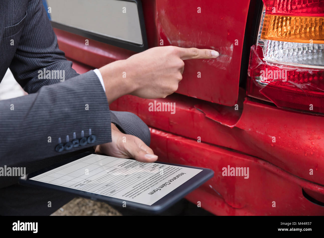 Insurance adjuster accident tablet hi-res stock photography and images ...