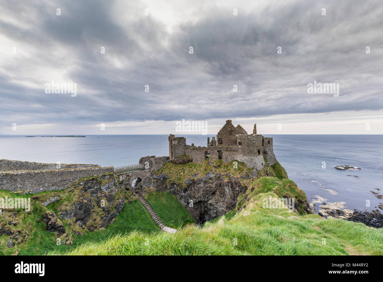 UK, Northern Ireland, County Antrim, Bushmills, Dunluce Castle ruins ...