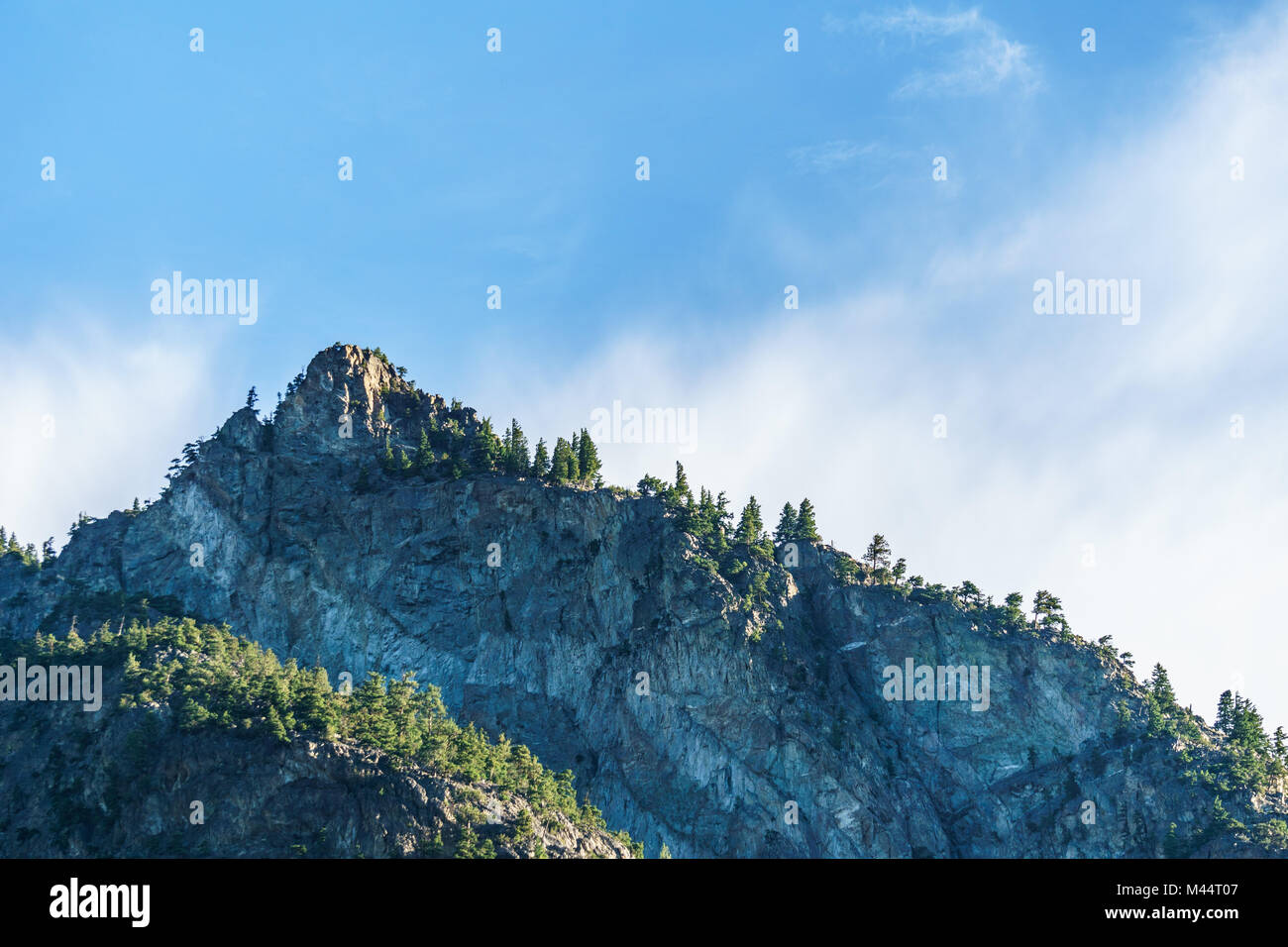 mountain in north British Columbia Canada and blue sky with clouds ...