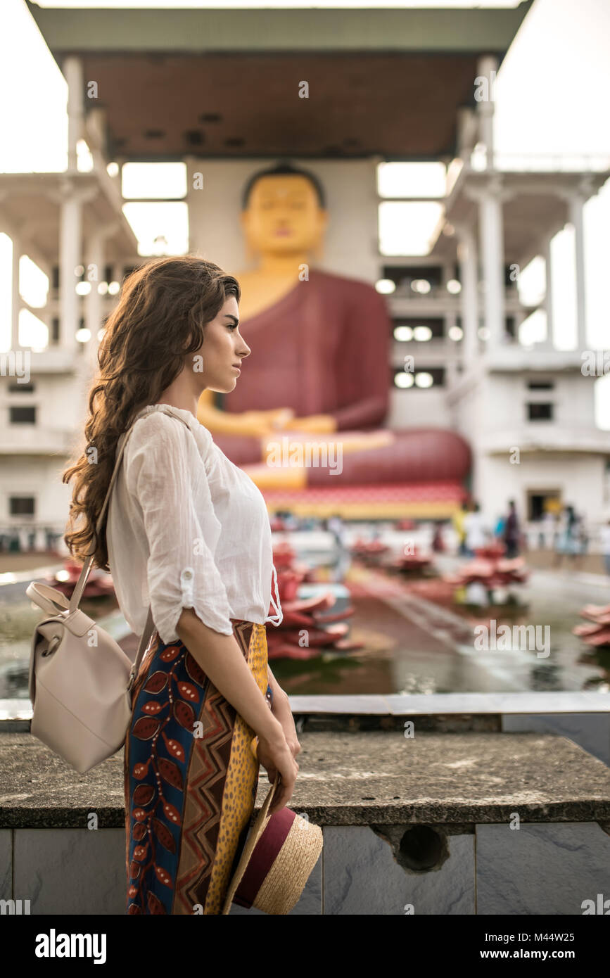Girl in buddhist temple Stock Photo - Alamy