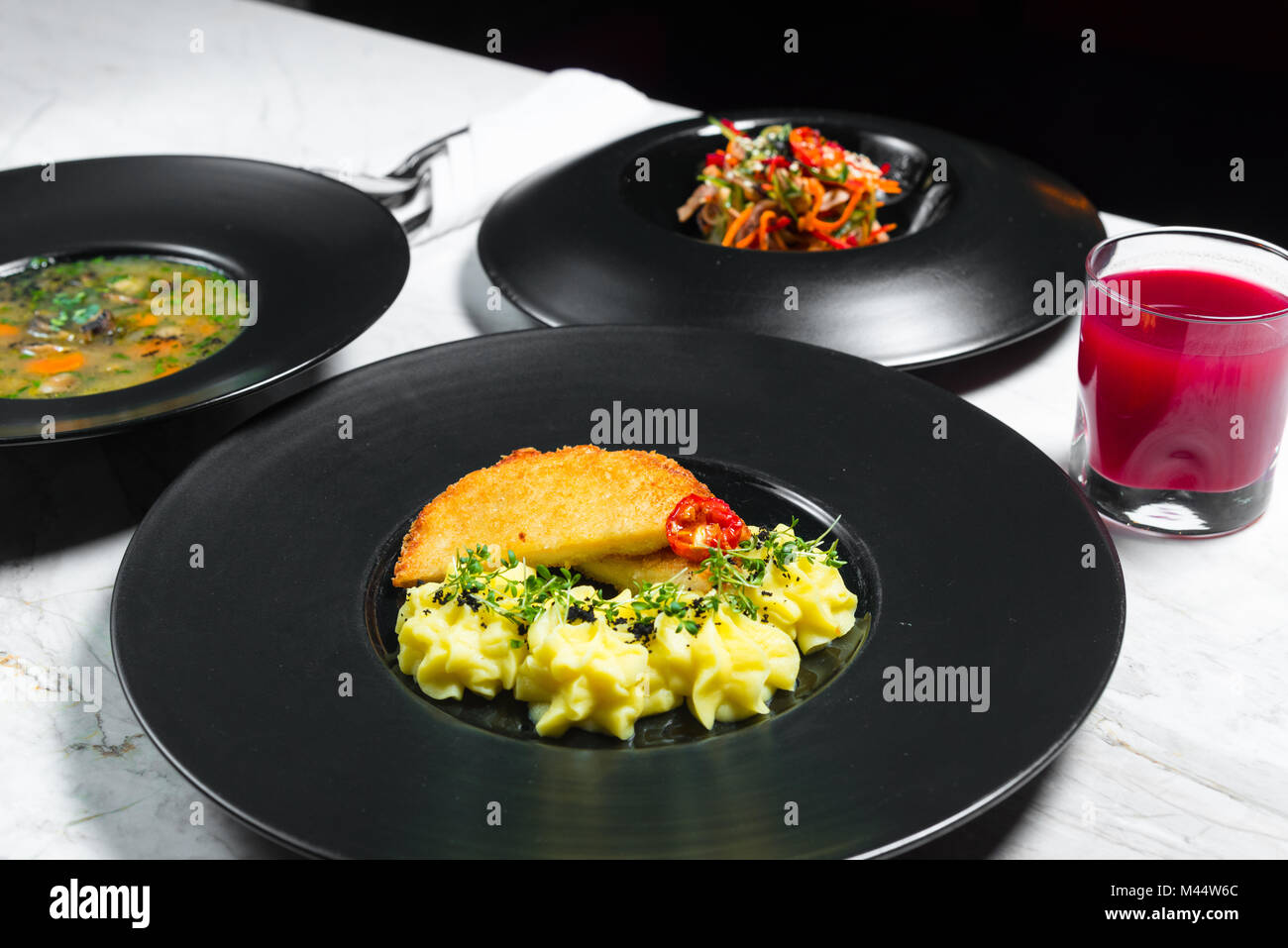 Chef's specialty presented in restaurant on served table Stock Photo ...