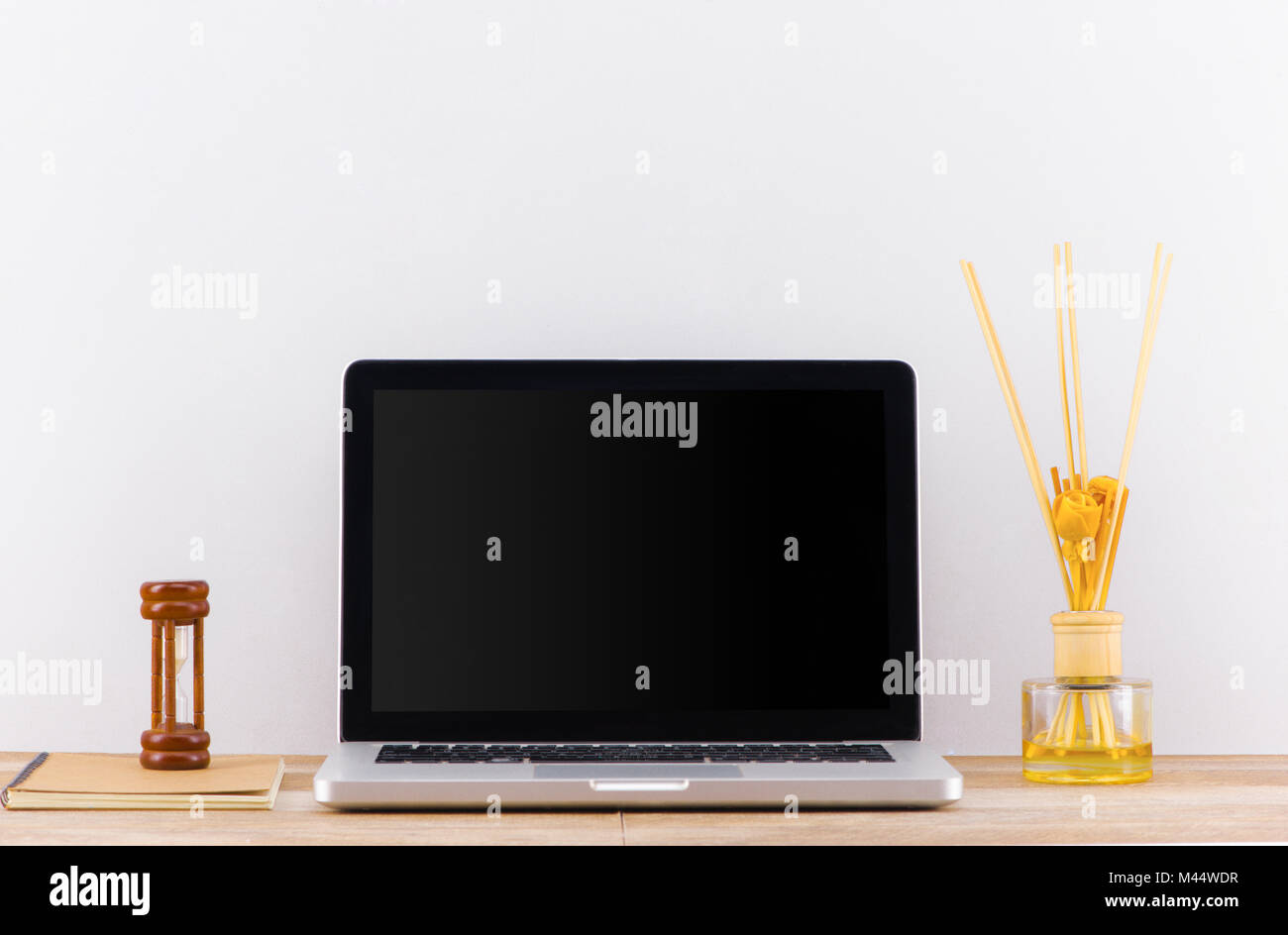 laptop computer white blank screen on work table front view Stock Photo ...