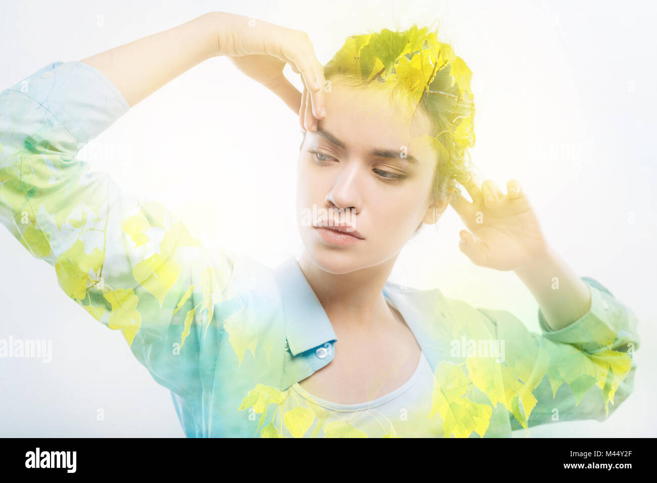 Smart student touching her forehead while thinking Stock Photo - Alamy Smart student touching her forehead while thinking Stock Photo - Alamy