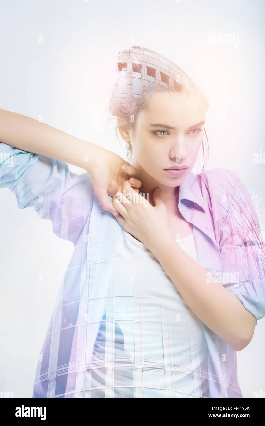 Serious woman looking concentrated while doing morning exercises Stock ...
