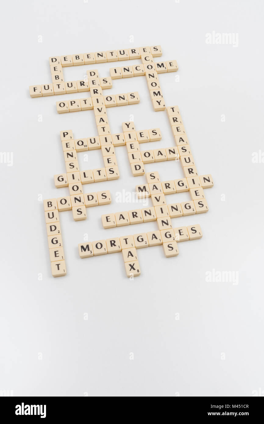 Alphabet tiles forming financial instruments, financial and money ...