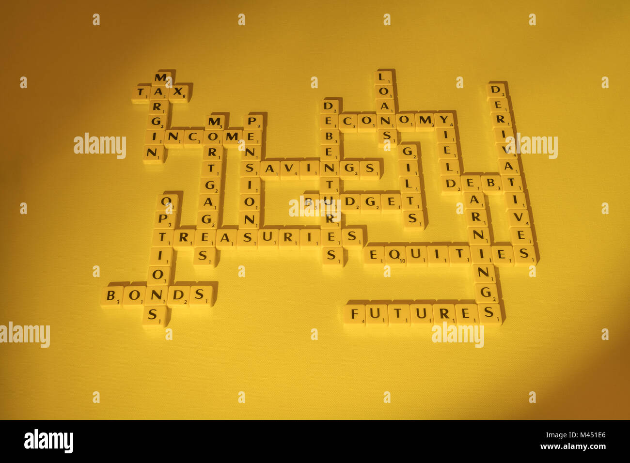 Alphabet tiles forming financial instruments, financial and money ...