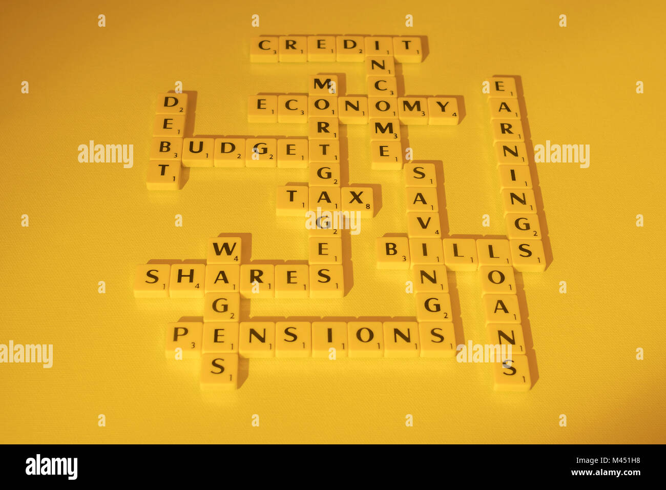Alphabet tiles forming financial instruments, financial money related ...