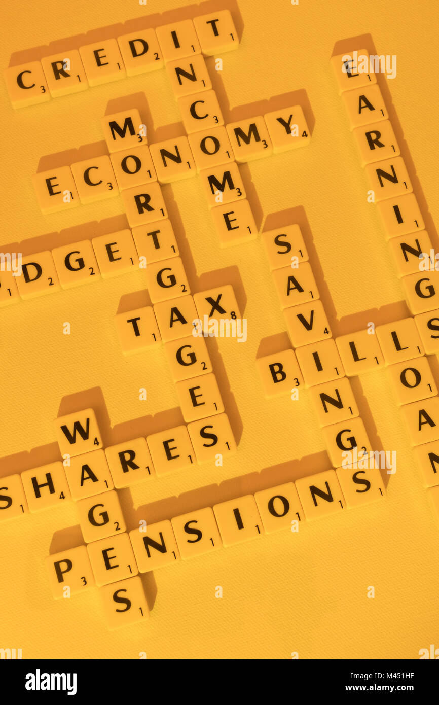 Alphabet tiles forming financial instruments, financial money related ...
