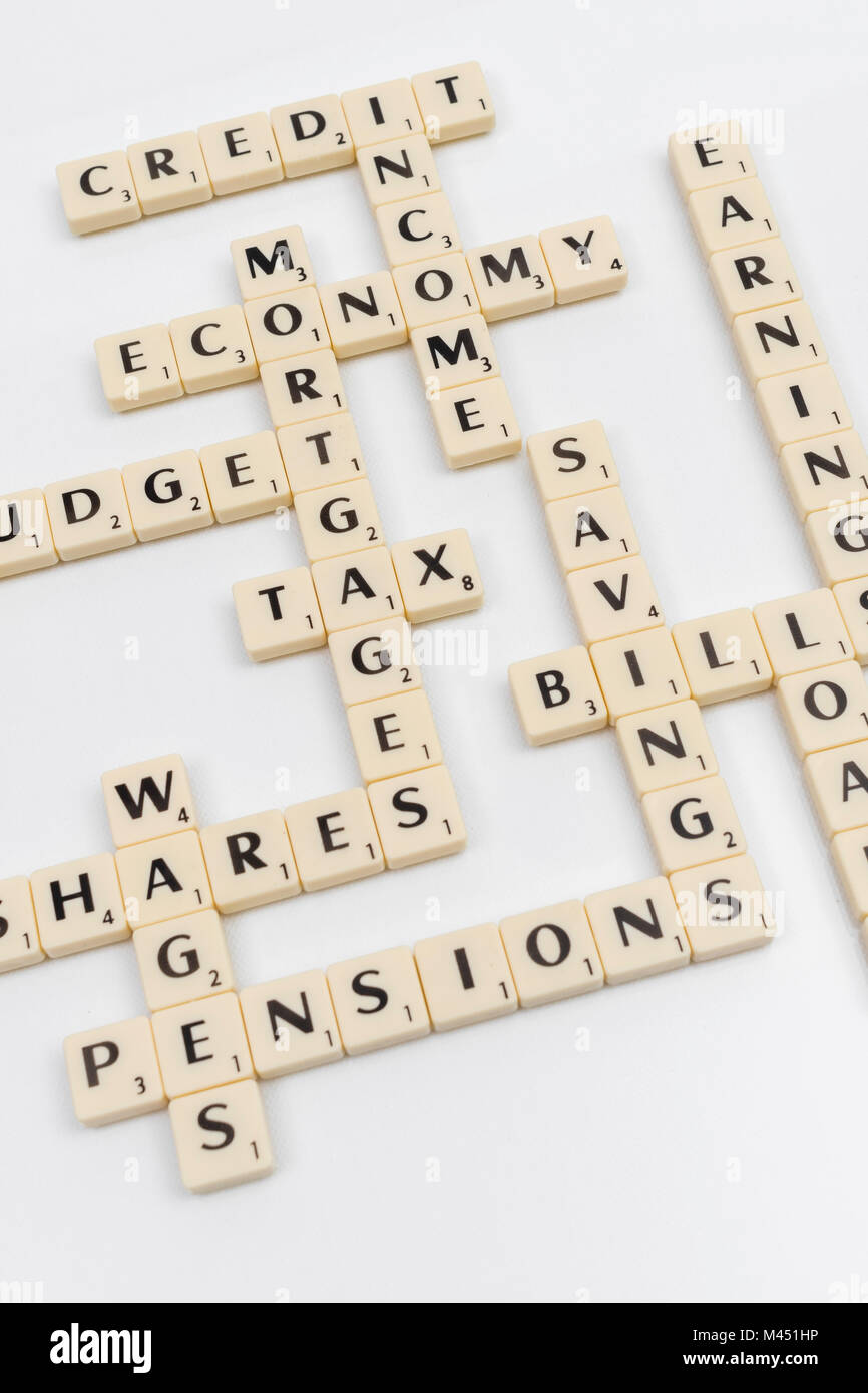 Alphabet tiles forming financial instruments, financial money related ...