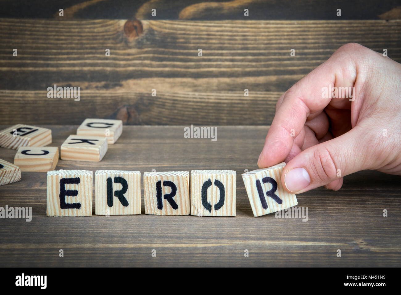 error. Wooden letters on the office desk, informative and communication ...