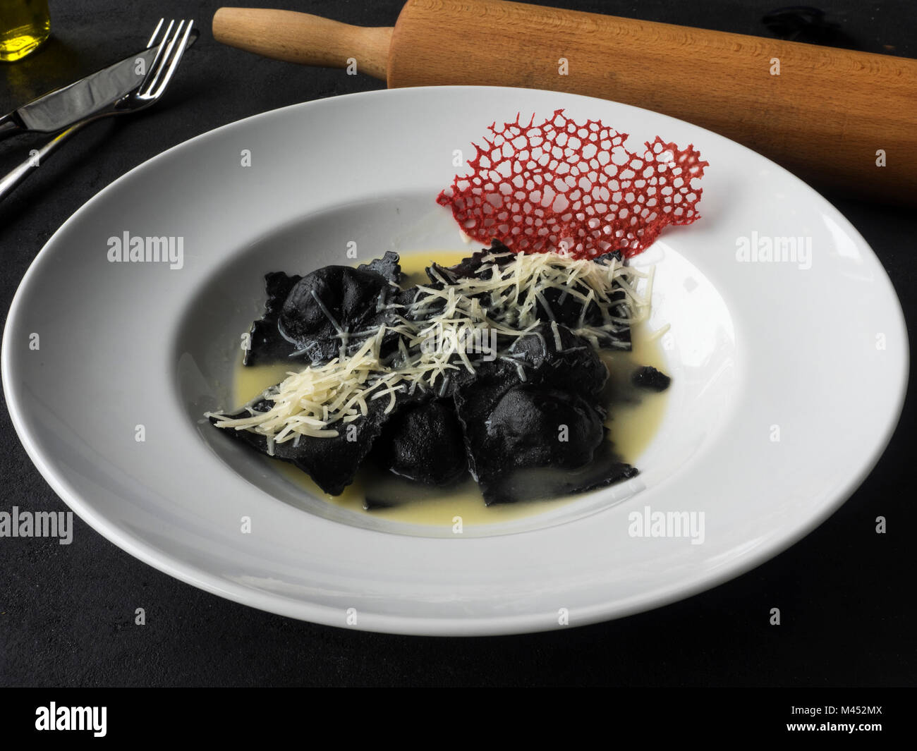 Black ravioli hi-res stock photography and images - Alamy
