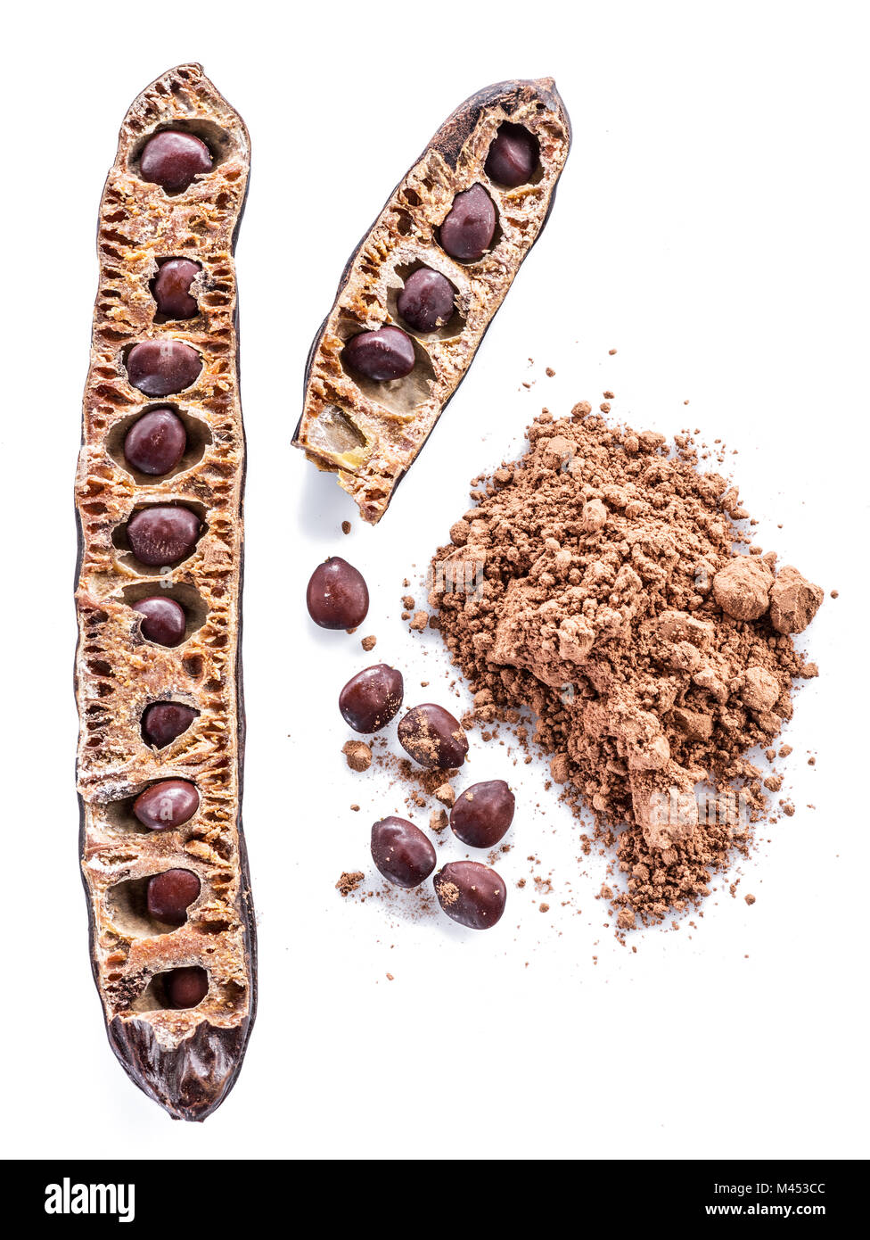 Carob pods and carob powder on the white background Stock Photo - Alamy