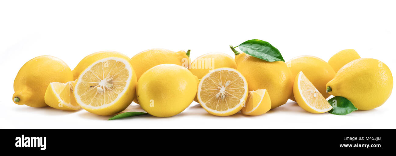 Lot of lemon fruits with lemon leaves isolated. Horizontal photo Stock ...
