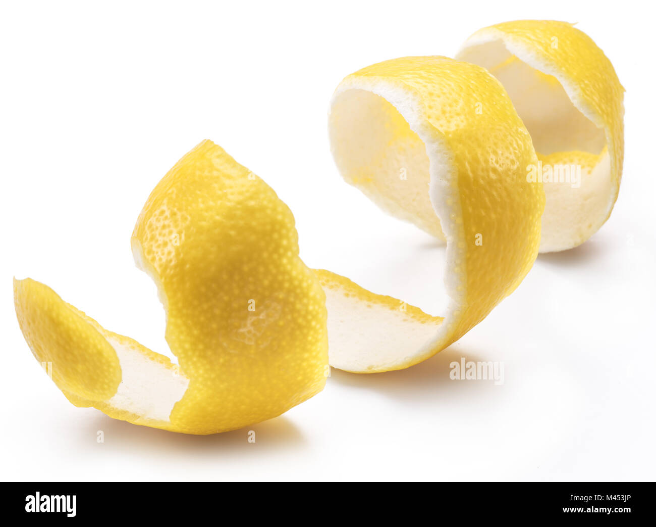 Lemon peel or lemon twist on white background. Close-up Stock Photo - Alamy