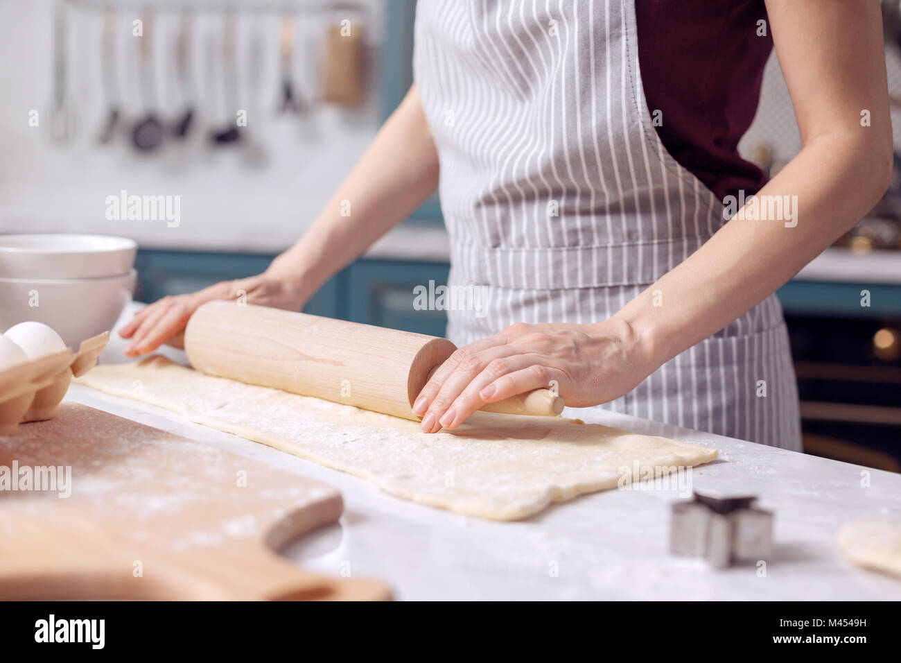 Female hands rolling out dough for biscuits Stock Photo - Alamy