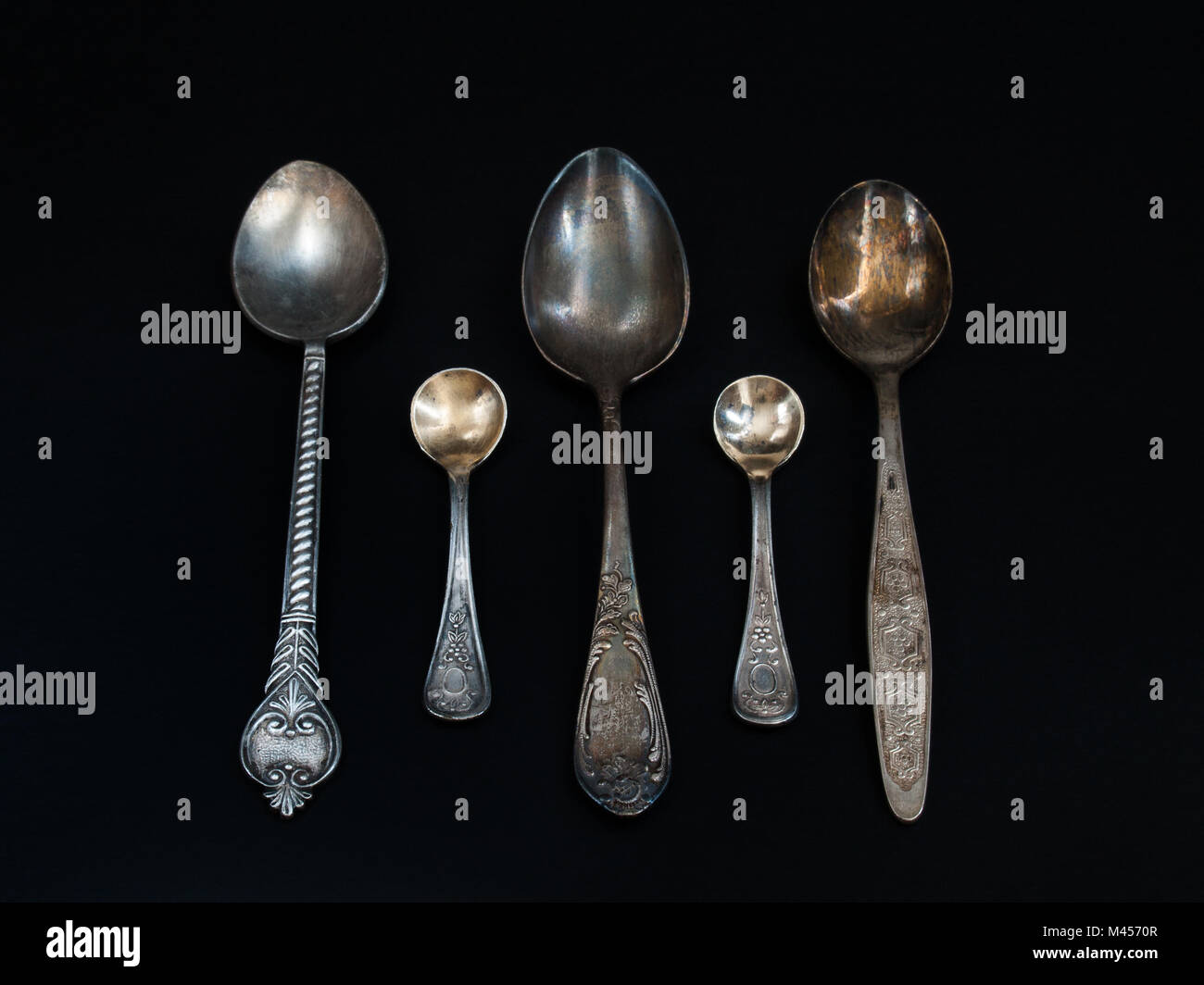Spoons tea vintage with a pattern, engraving of different size and ...