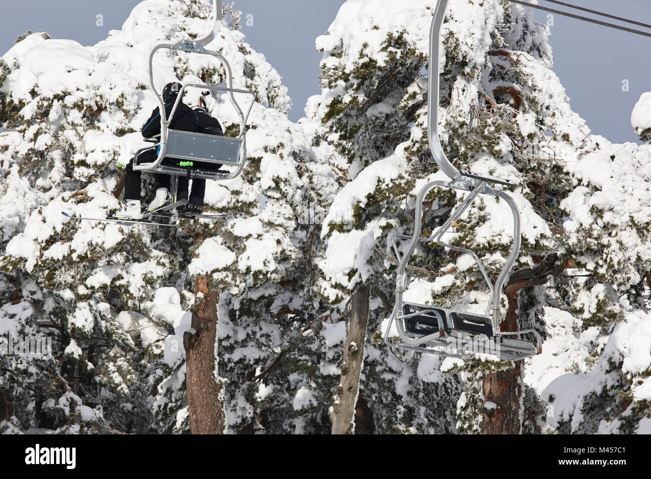 Ski lift and slope on a snow landscape. Winter sport Stock Photo - Alamy