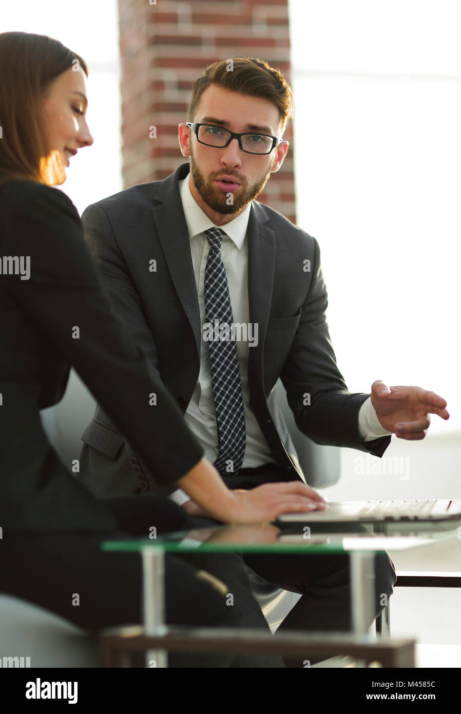 Coworking, Creative manager showing new startup idea Stock Photo - Alamy