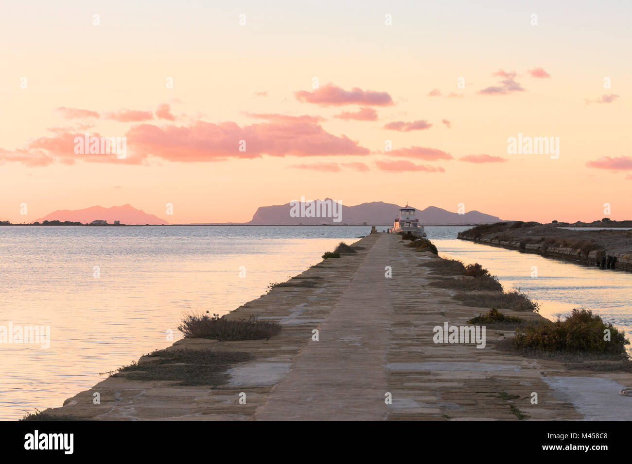 Pier at sunset on the coast connecting Marsala to Trapani, Trapani ...