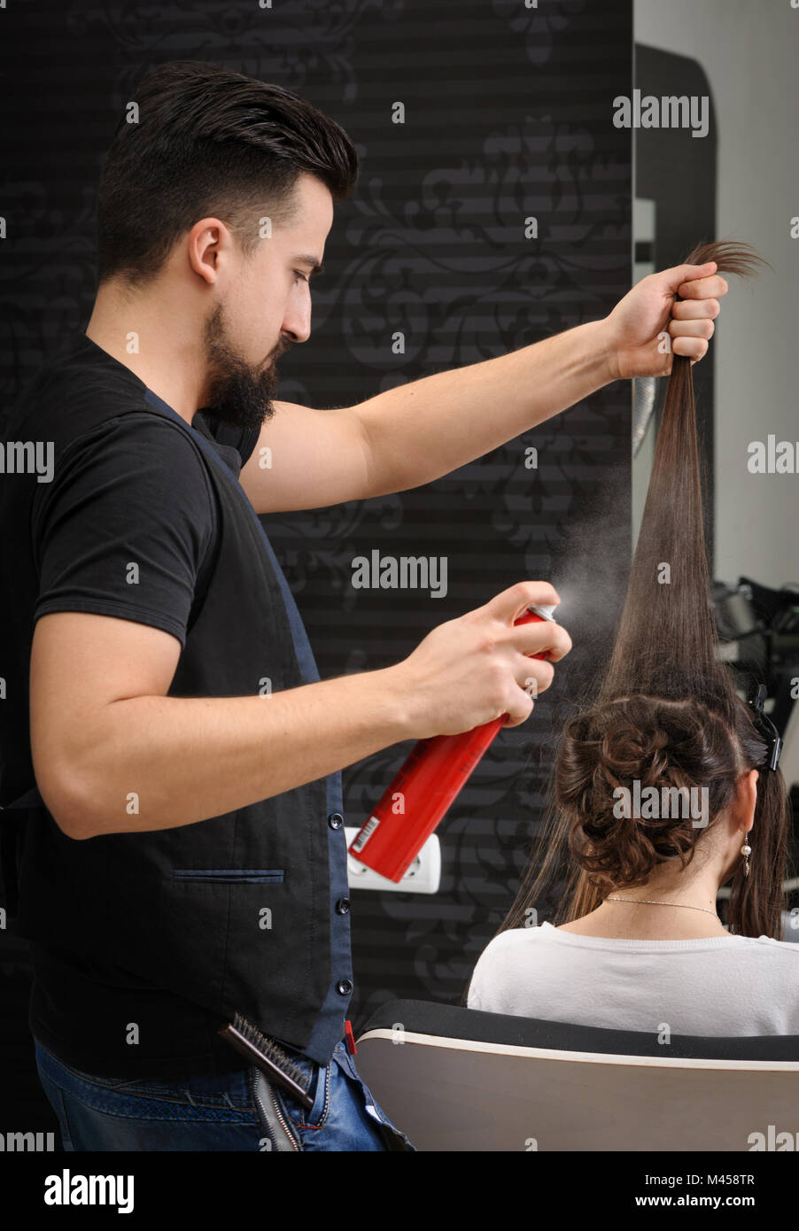 Professional hairdresser man at work Stock Photo - Alamy