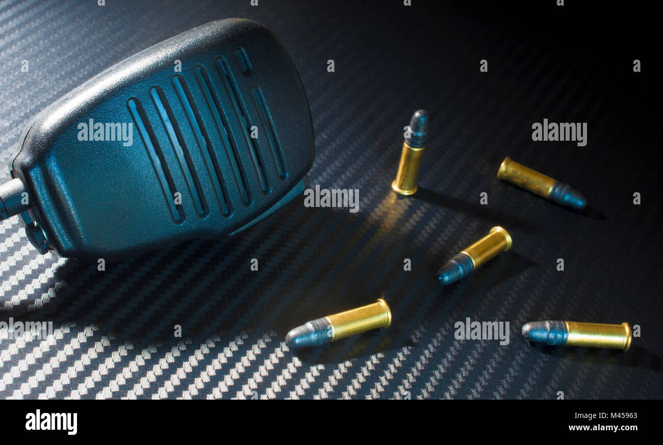 Rim fire ammo with a police style microphone Stock Photo - Alamy