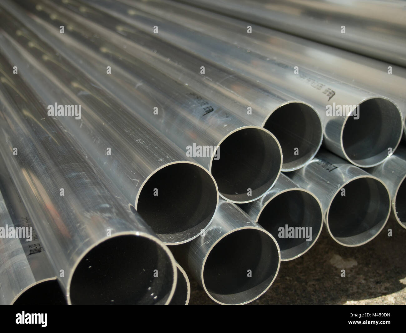 Stack of Many Pipes at the Construction Site Stock Photo - Alamy
