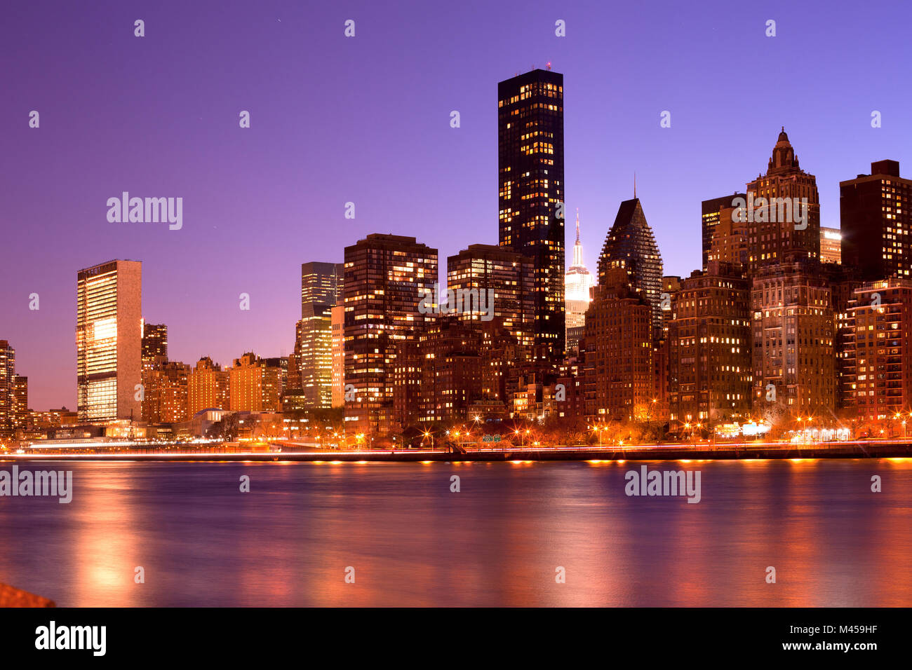 Skyline of midtown Manhattan at night, New York City, USA Stock Photo ...