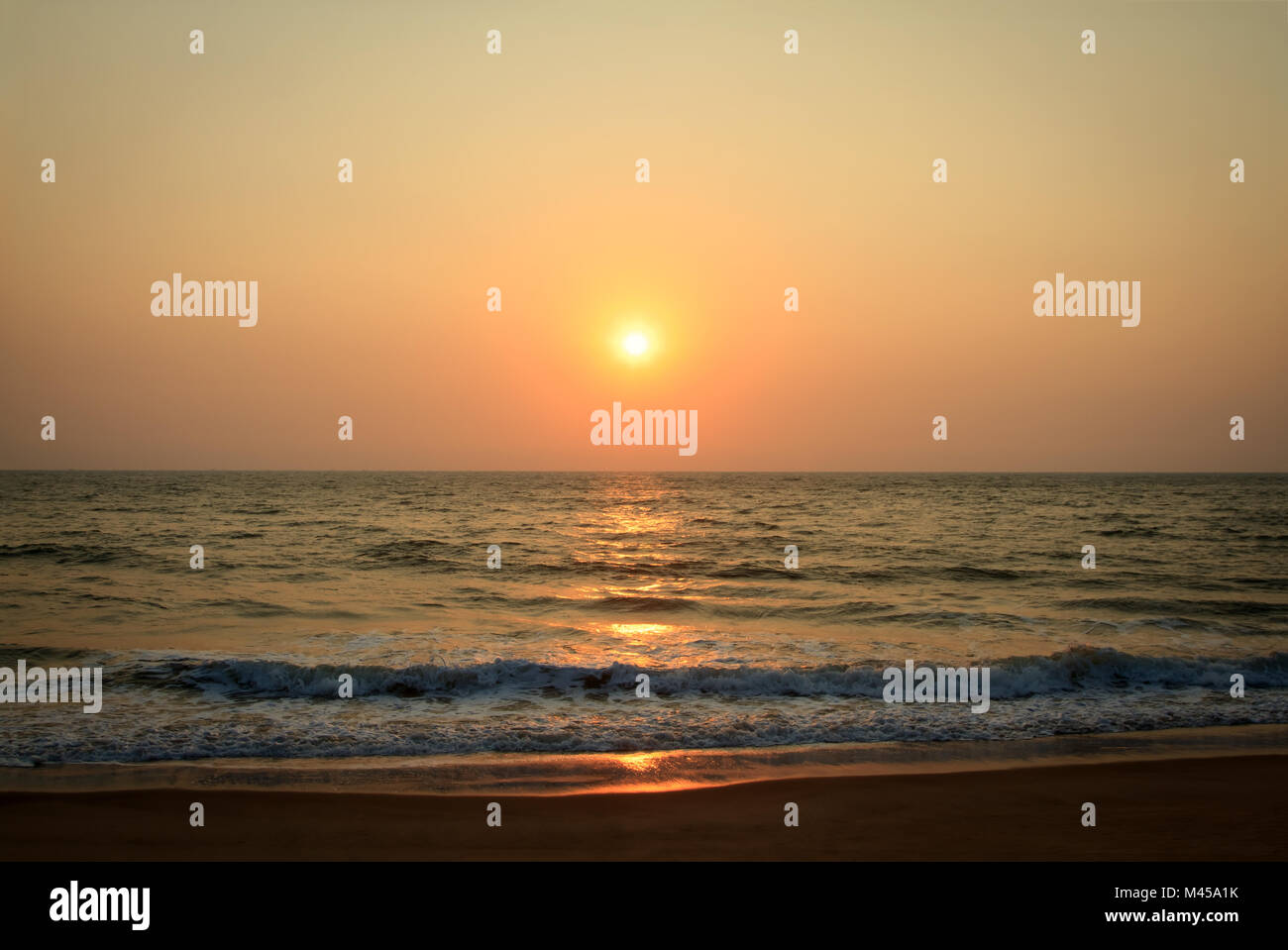 Evening scene with sunset on the sea Stock Photo - Alamy
